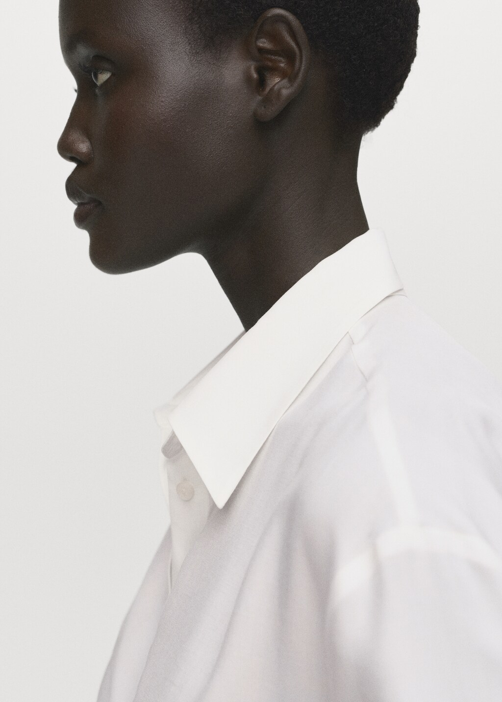 Lyocell shirt with hidden buttons - Women | MANGO USA