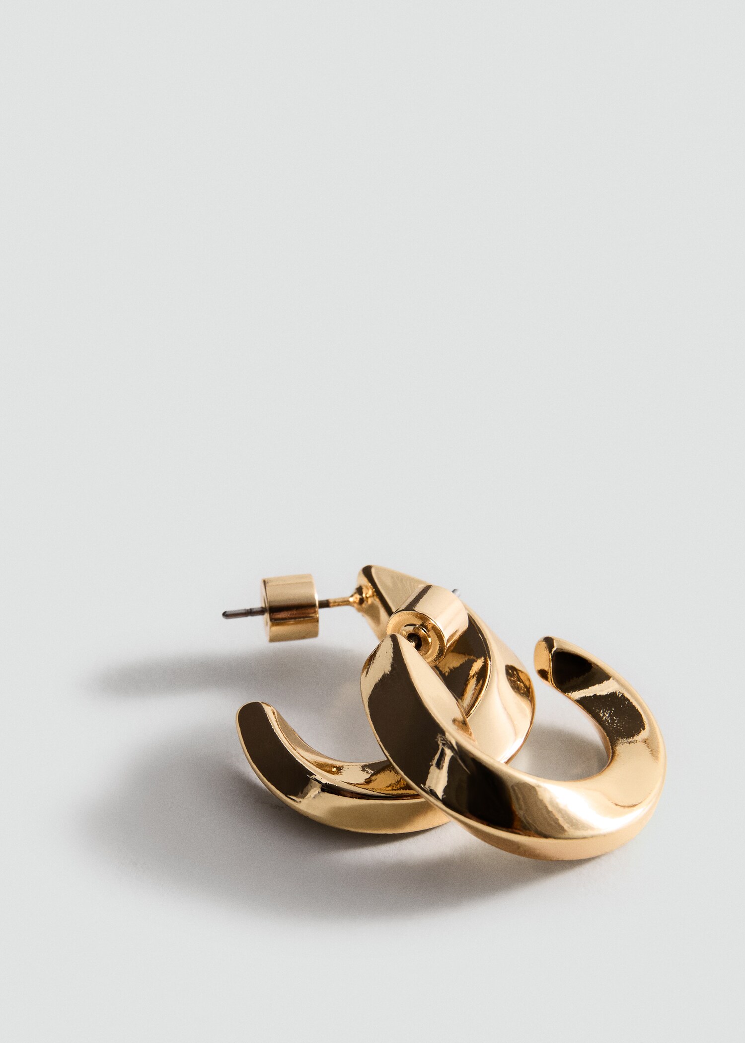 Twisted hoop earrings - Women | MANGO Kuwait