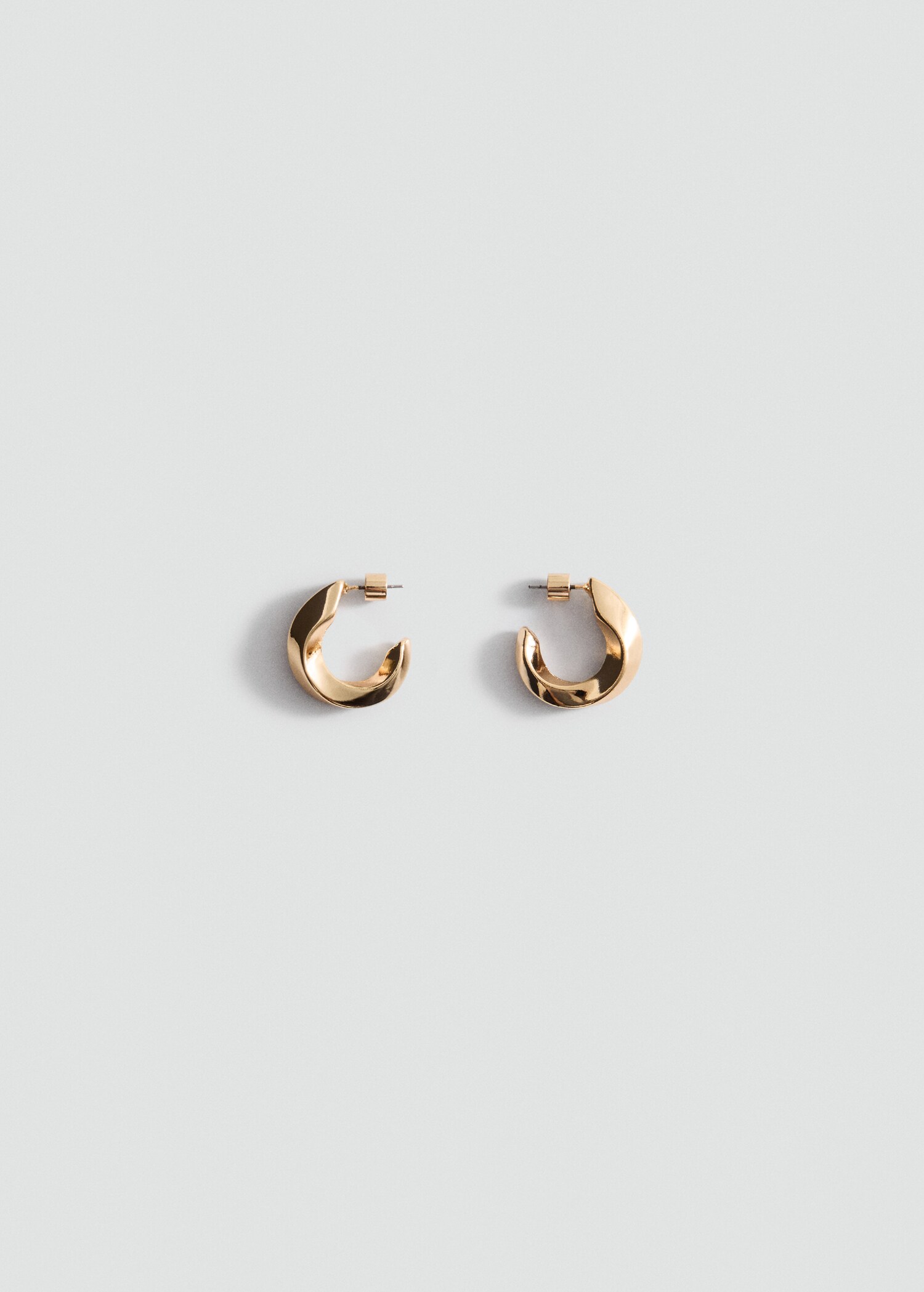 Twisted hoop earrings - Women | MANGO Kuwait