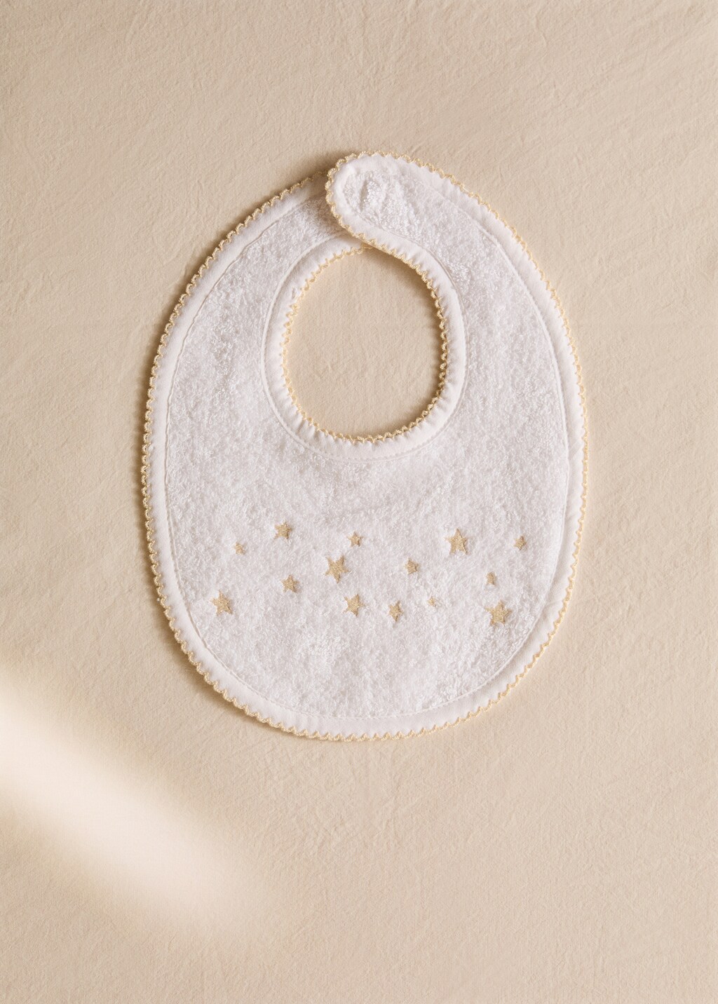 Embroidered cotton bib with stars - Home | MANGO USA