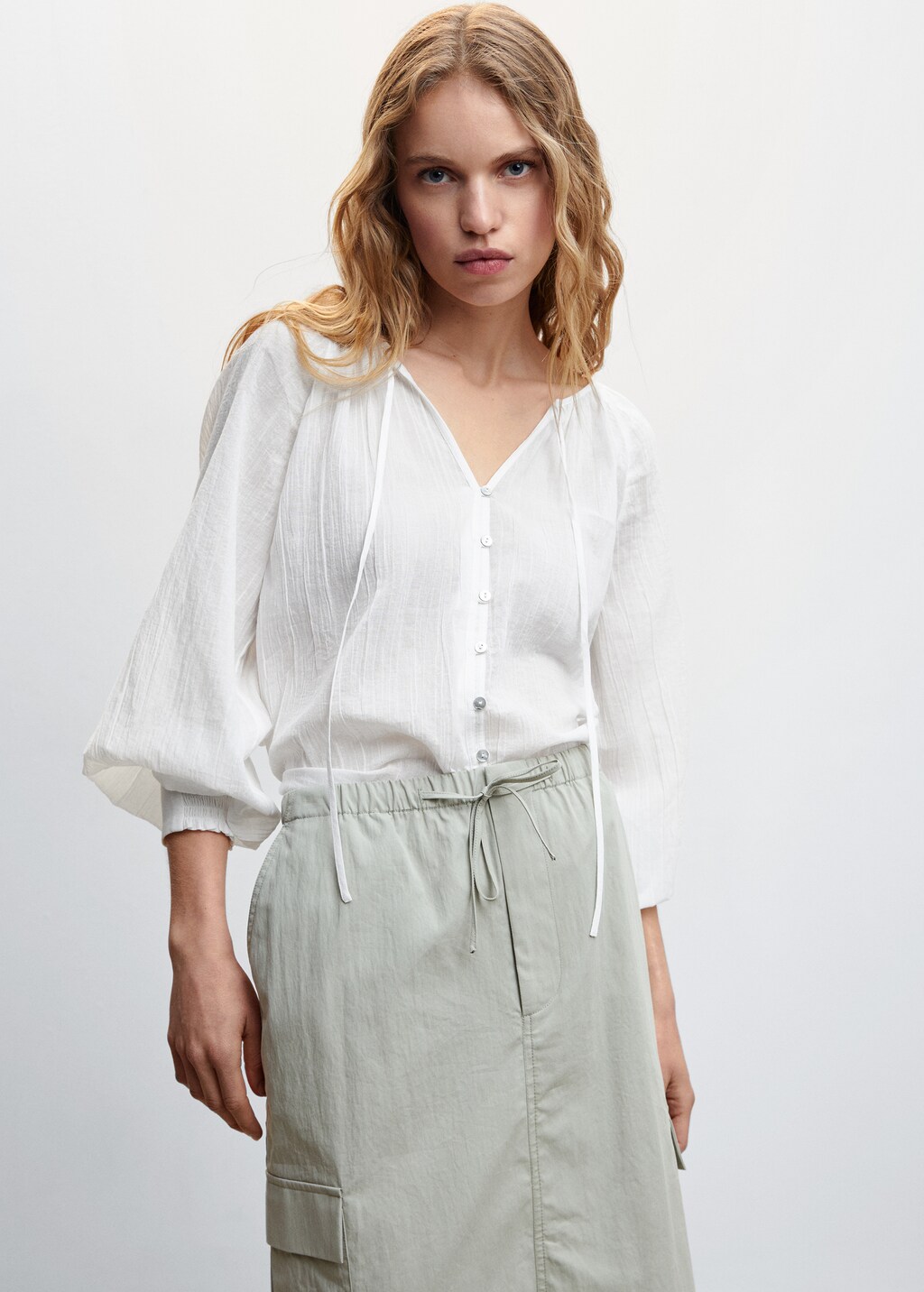 Buttoned textured blouse - Women | MANGO Iran
