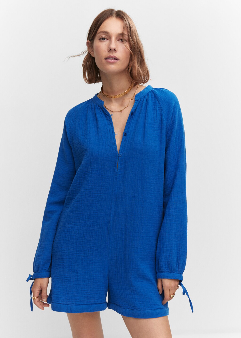 Short jumpsuit with buttons
