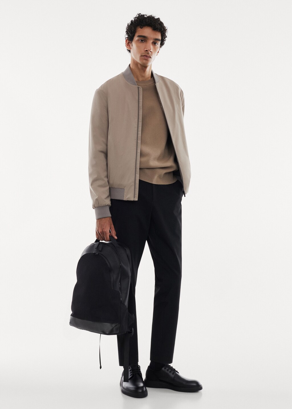 Water-repellent leather-effect backpack - Man | MANGO Pakistan