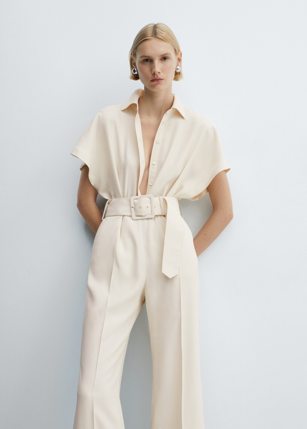 Lange jumpsuit met ceintuur - Dames | MANGO Nederland
