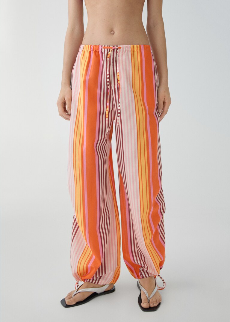 Parachute pants with striped print - Woman | MANGO USA