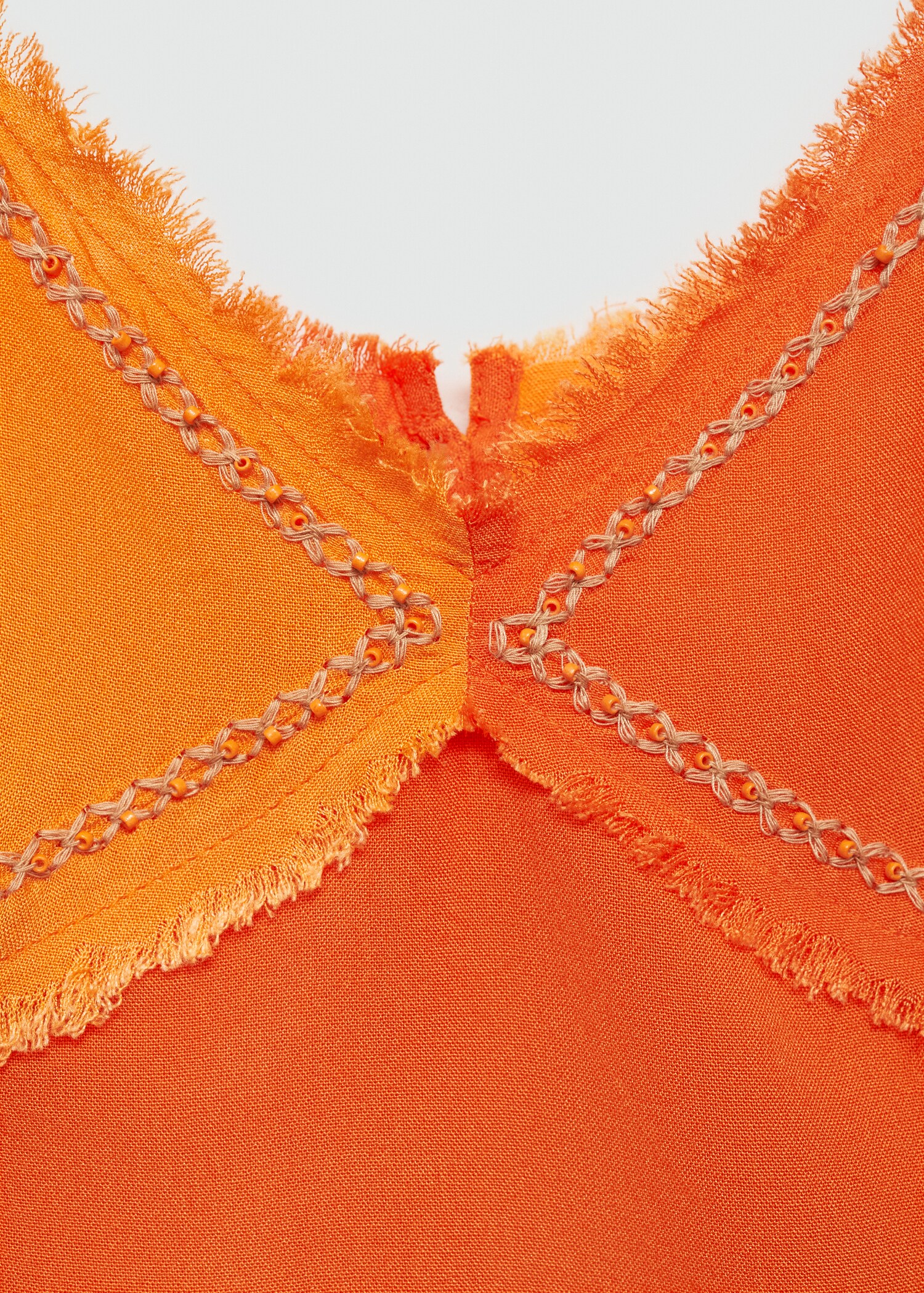 Contrast top with beaded details - Teen | MANGO USA