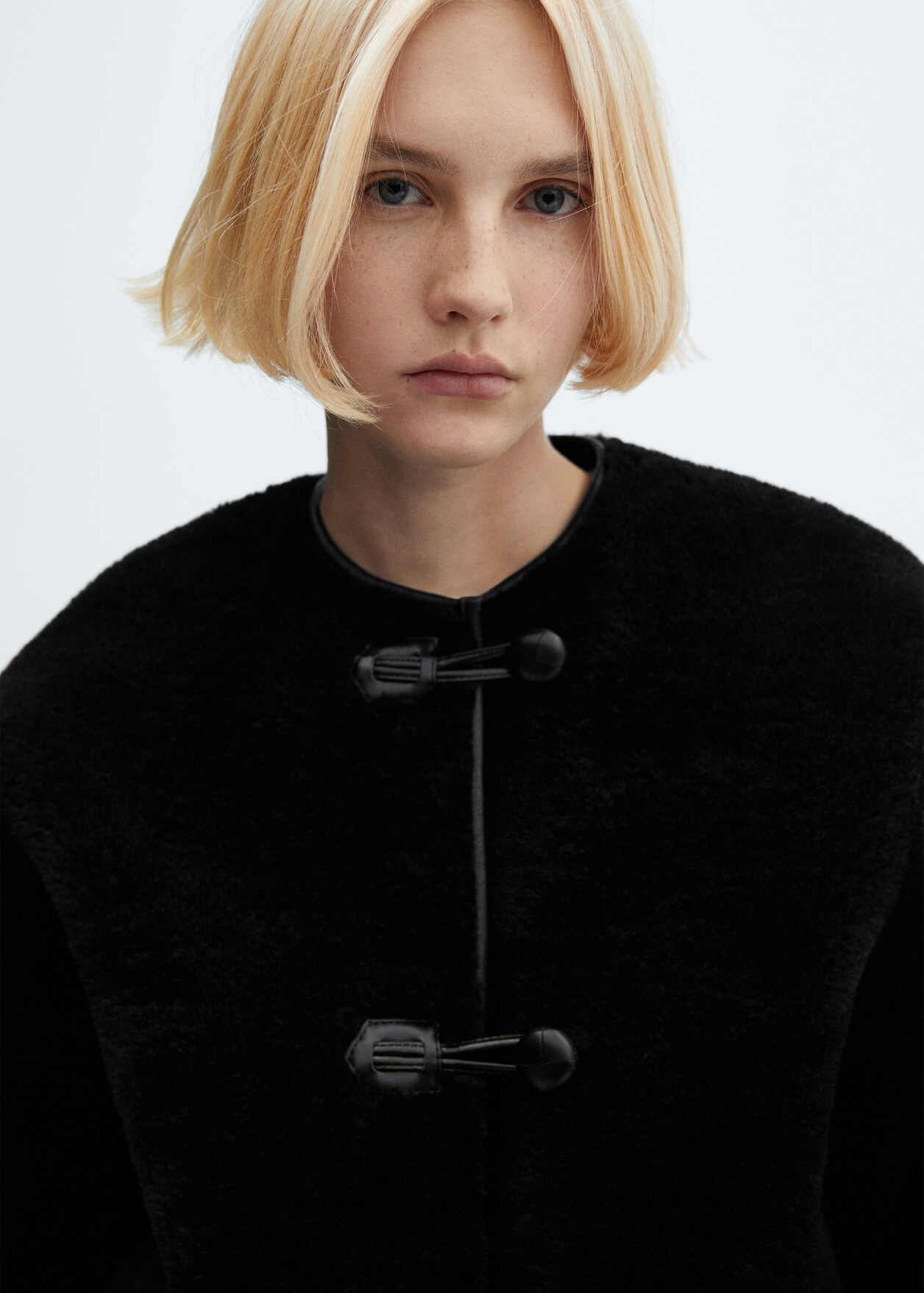 Fur-effect coat with appliqués - Woman | MANGO USA