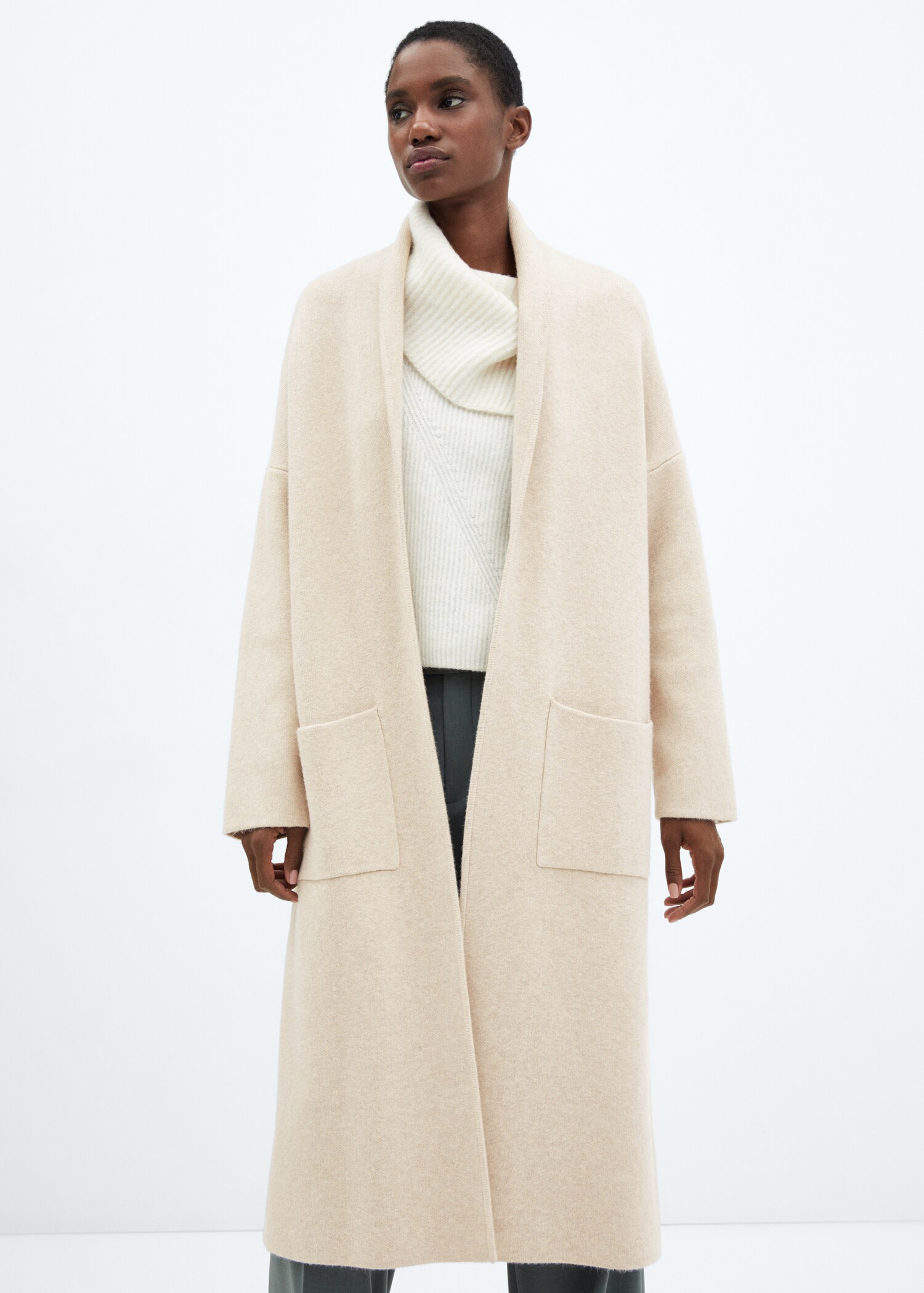 Oversized knitted coat with pockets - Women | MANGO USA