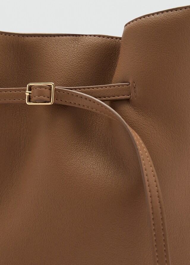Bucket bag with buckle - Women | MANGO USA