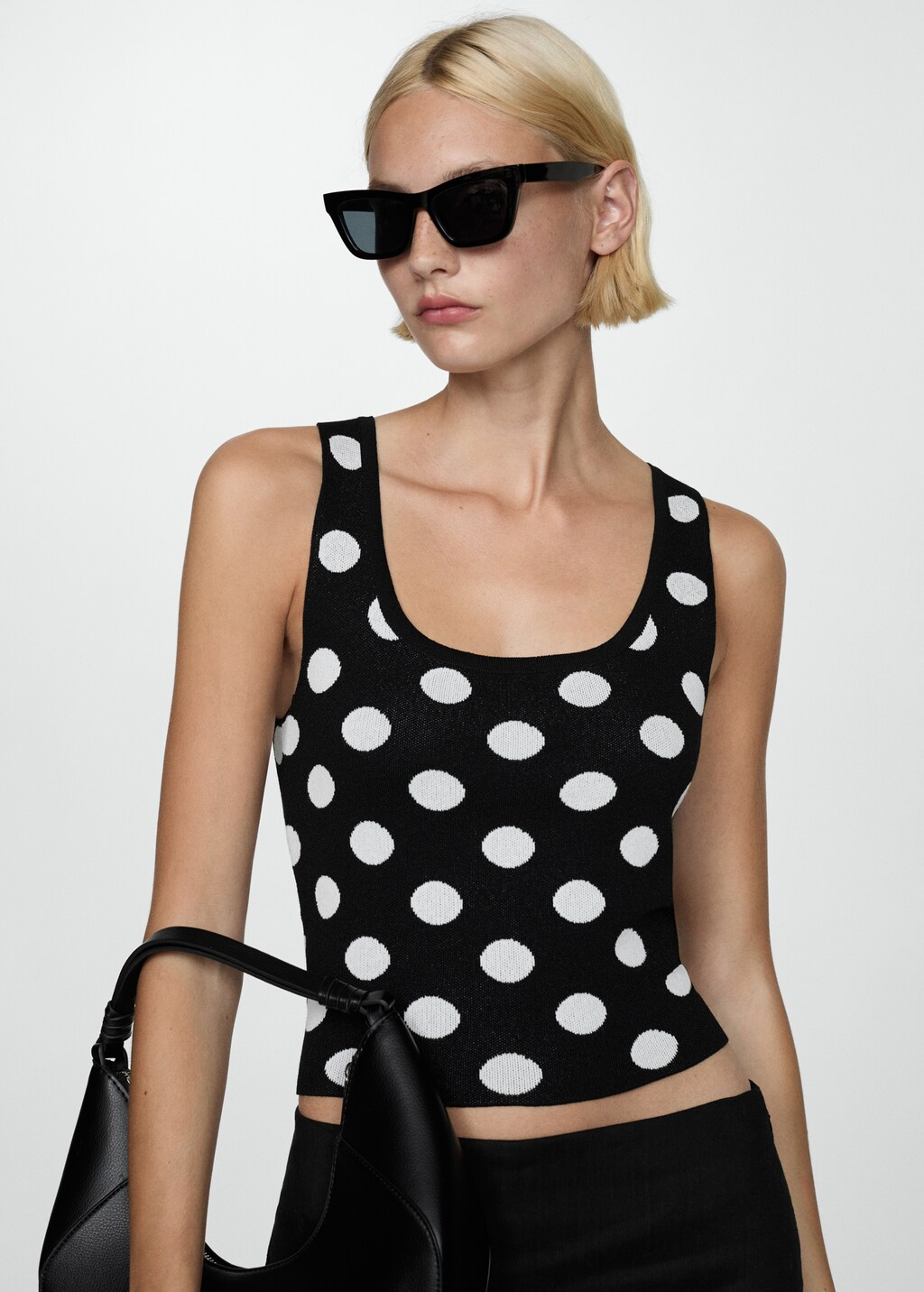 Polka-dot knitted top - Woman | MANGO United Kingdom
