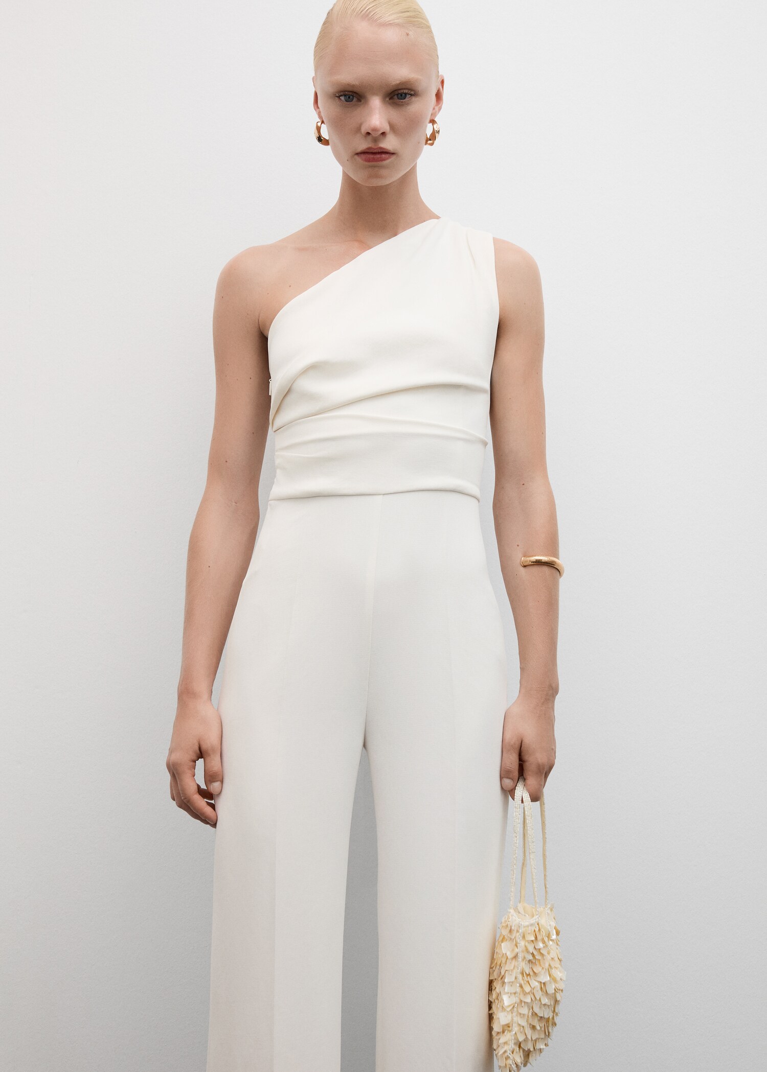 Asymmetrical jumpsuit with draped detail - Women | MANGO Lebanon