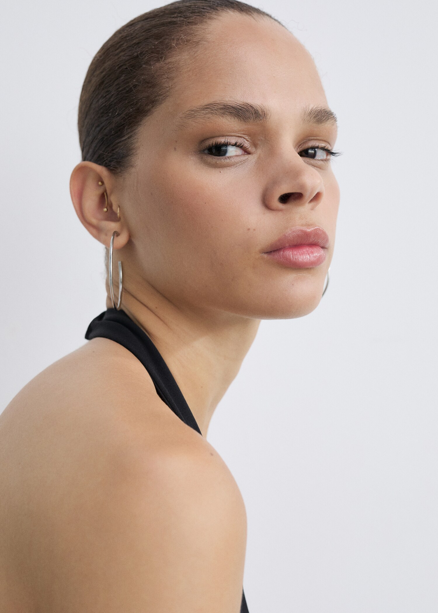 Halter-neck jumpsuit with belt - Women | MANGO USA