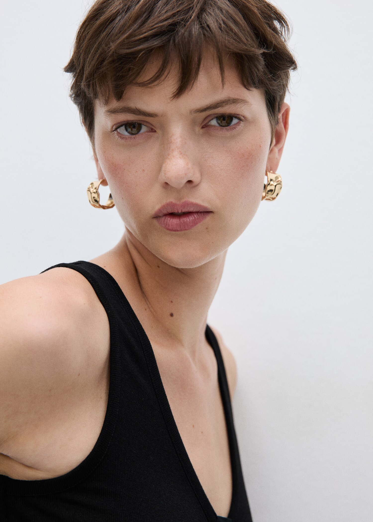 V-neck bodysuit with buttons - Women | MANGO USA