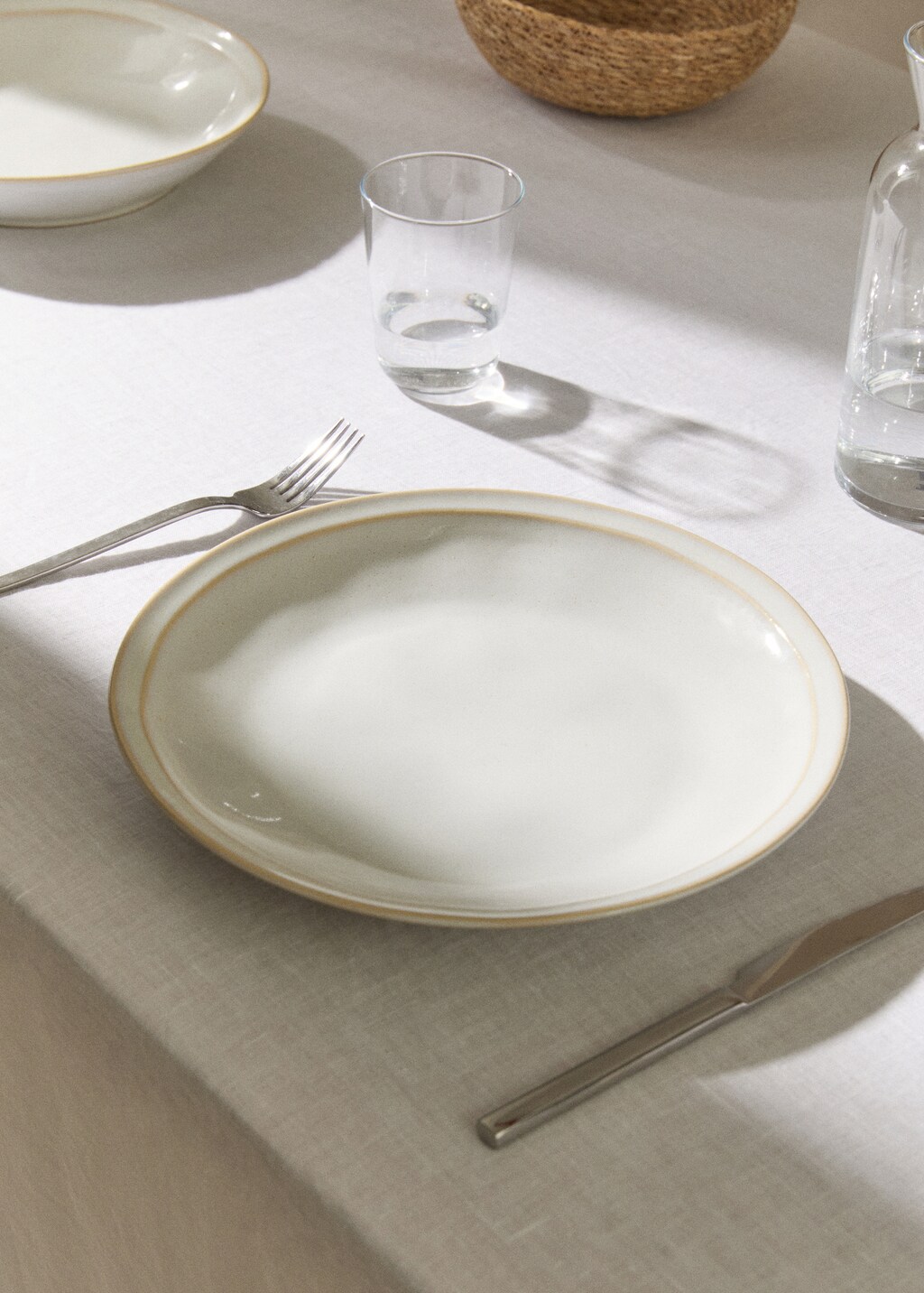 Aged double-edged stoneware dinner plate