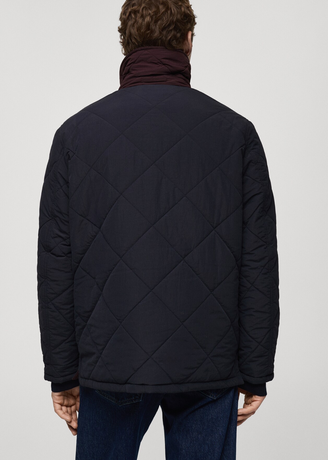 Two-tone reversible quilted jacket - Men | MANGO USA