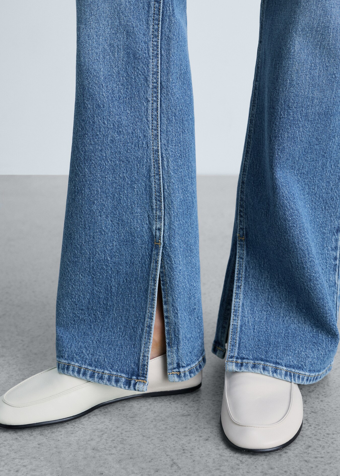 Medium-rise straight jeans with slits - Women | MANGO Canada