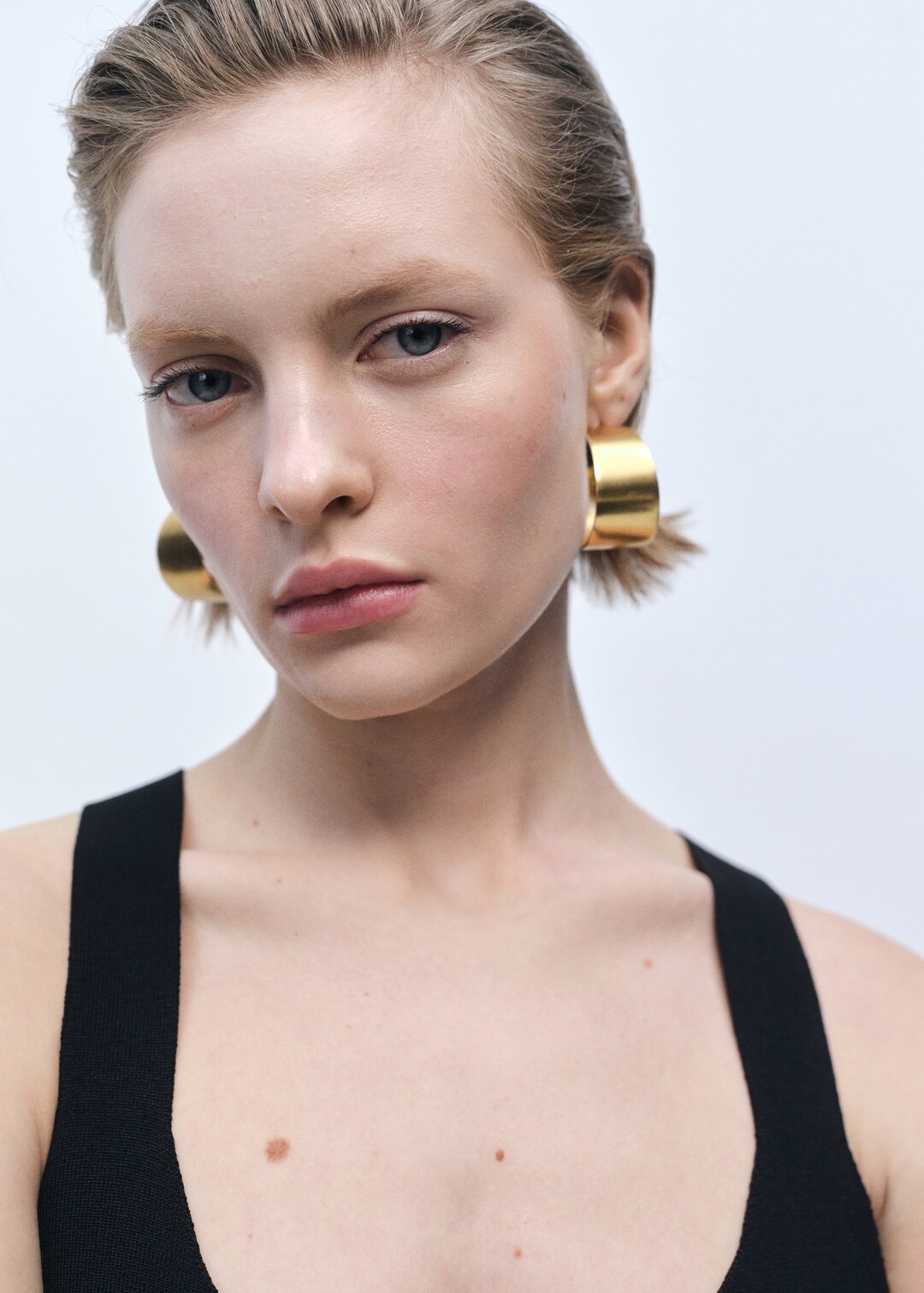 Fine-knit peplum top - Women | MANGO USA