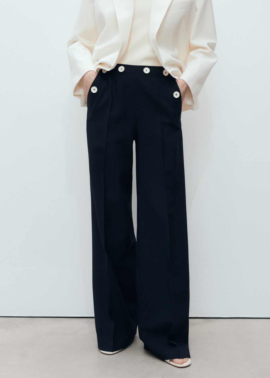 Straight-fit pants with contrasting buttons - Women | MANGO USA