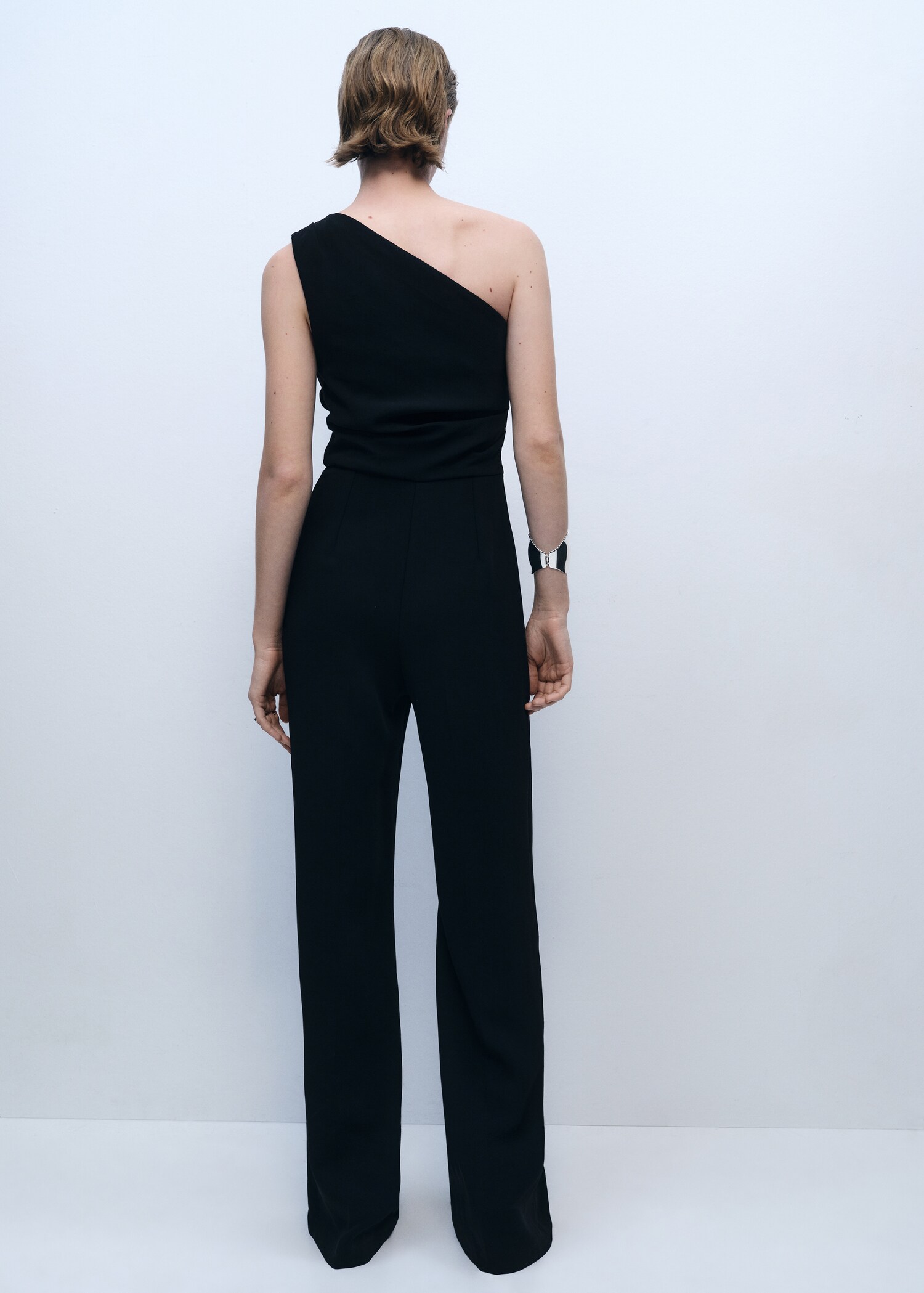 Asymmetrical jumpsuit with draped detail - Women | MANGO USA