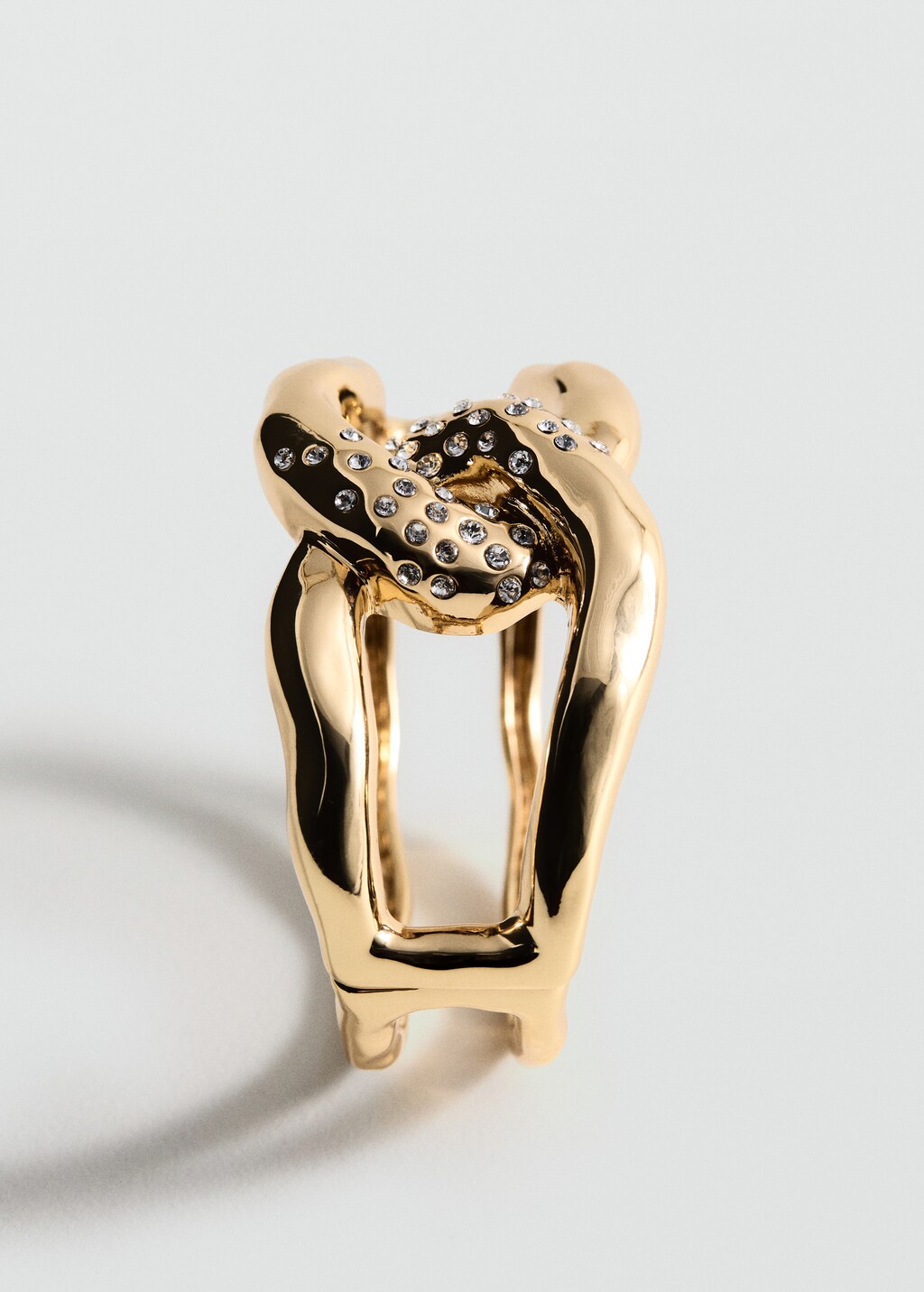 Shiny intertwined bracelet - Women | MANGO Singapore